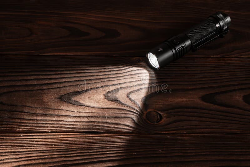 Flashlight and a Beam of Light in Darkness. a Modern Led Lamp with ...