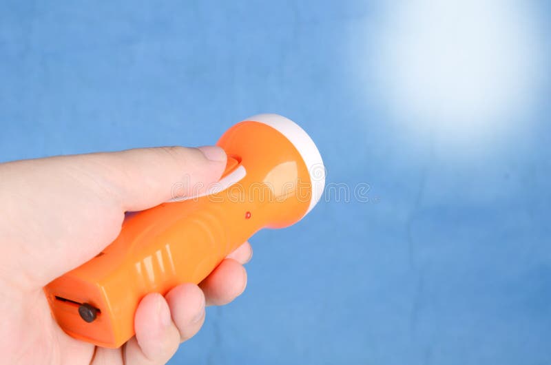 Flashlight in hand stock photo. Image of highlight, illumination - 27828378