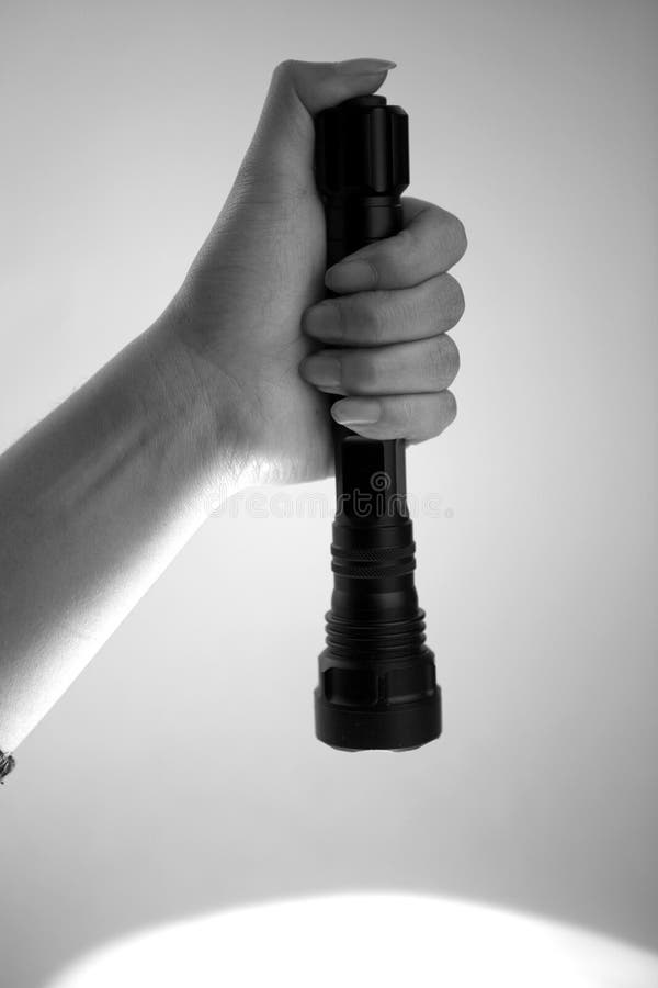 Flashlight in hand, stock photo. Image of finger, design - 7619596