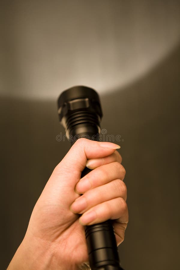 Flashlight in hand, stock photo. Image of holding, abstract - 7619742