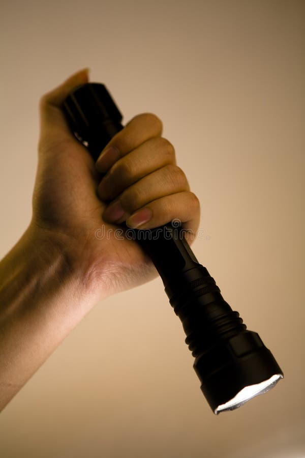 Flashlight in hand, stock photo. Image of handheld, lamp - 7621060