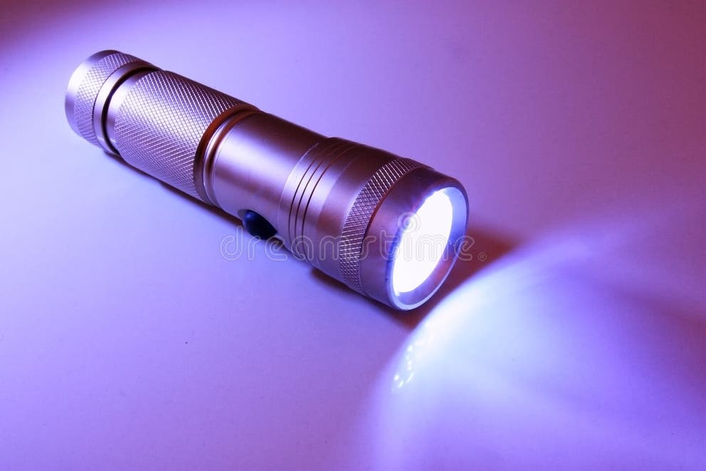 Flashlight and light ray stock photo. Image of heavy - 12664860
