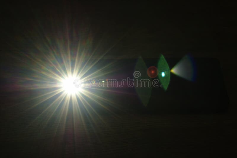 Flashlight of Mobile Phone on Table in Dark Night Stock Photo - Image ...