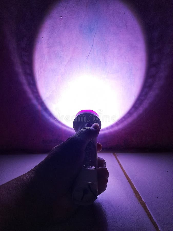The Flashlight Reflects Beautiful Colour on the Wall at Night Stock ...