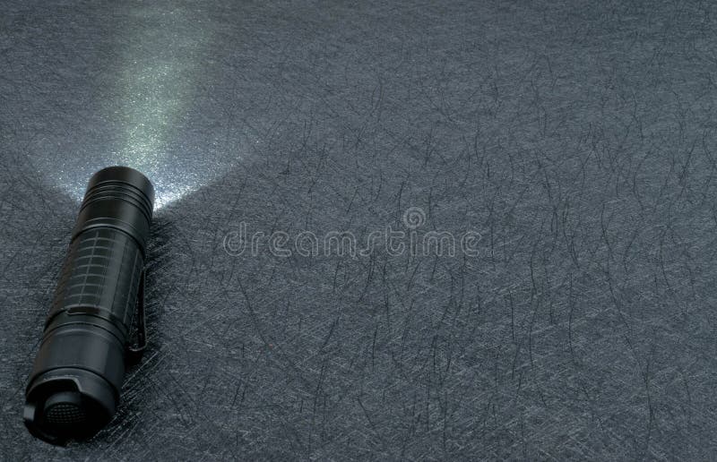 Flashlight Shining on a Black Background. Nice Copy Space Stock Photo ...