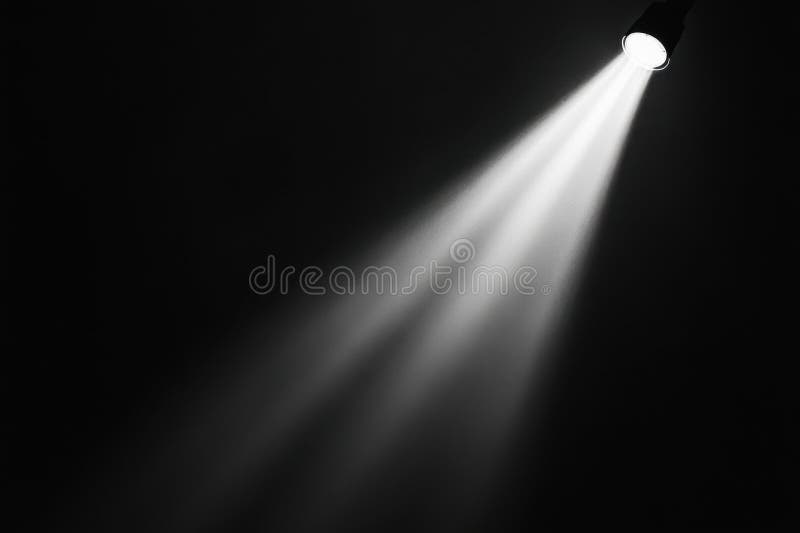 A Single Flashlight Beam Illuminating a Dark Background Stock ...