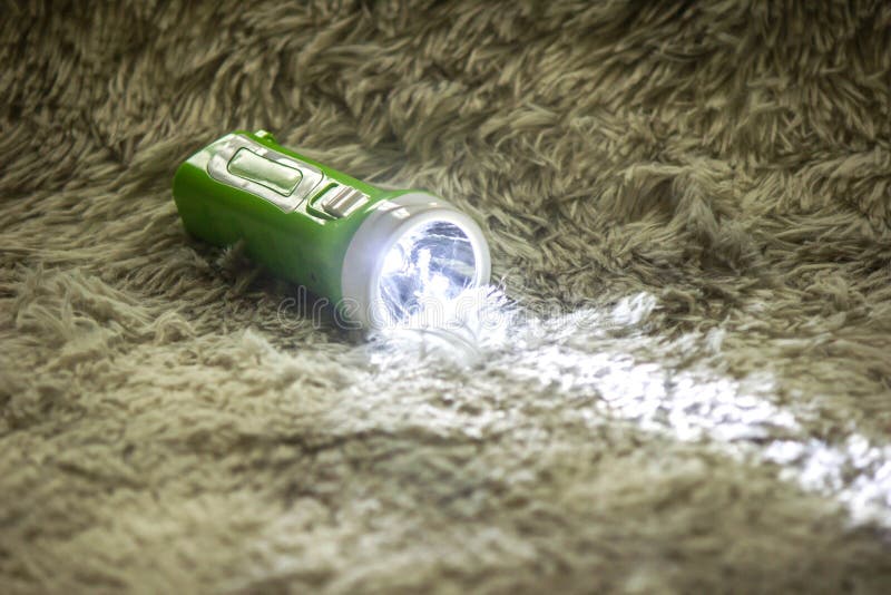 The Green Flashlight is on. Stock Image - Image of emergency, light ...