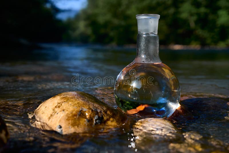 Flask with Clear River Water Stock Photo - Image of drinkable, micelle ...