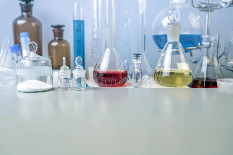 Flasks, Test Tubes and Laboratory Glassware with Solutions of Different ...