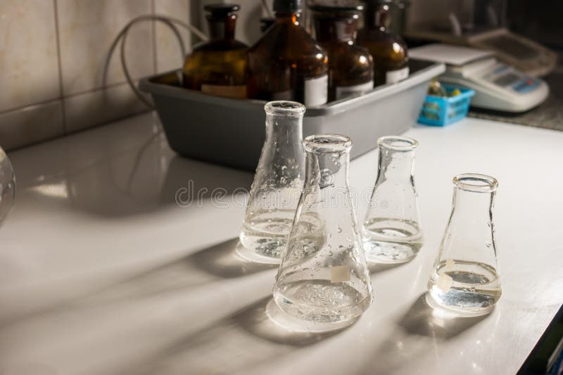 Flasks with Transparent Liquid. Stock Photo - Image of flask ...