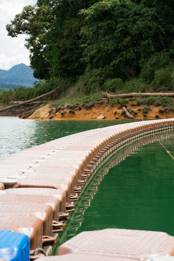 A Flat Buoyant Structure of Plastic Box Fastened Together, Used As a ...