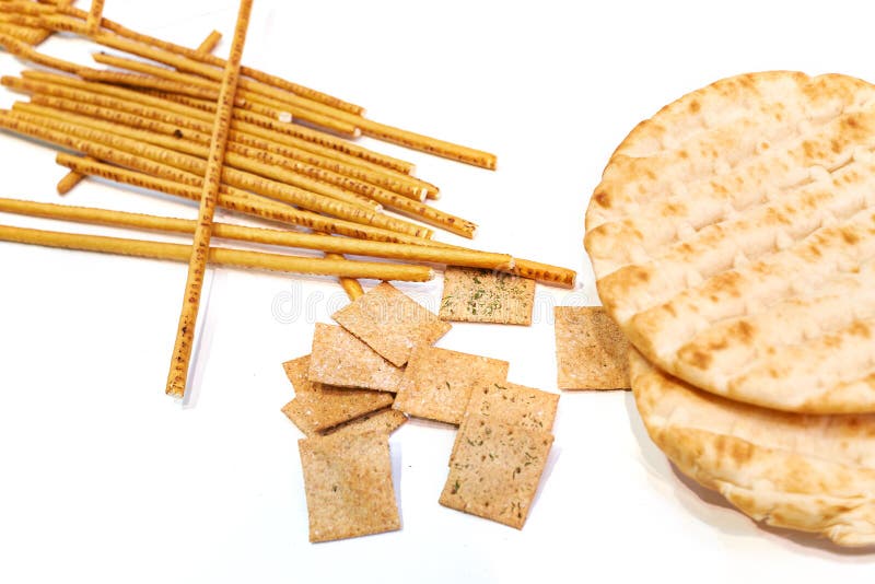 Flat Cakes, Breadcrumbs, Bread Sticks, Chips Isolated Stock Photo ...