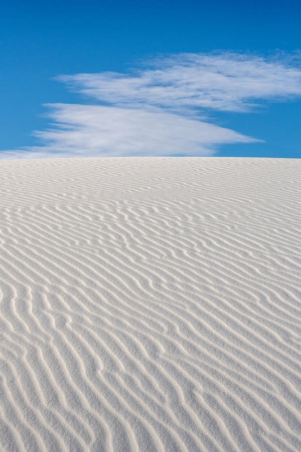 Flat Cloud Crests Over White Sand Dune with Ripple Texture Stock Image ...