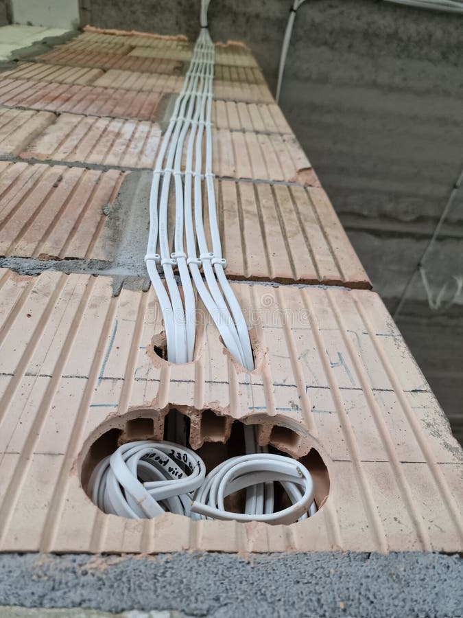 Flat Electric Cables on the Wall Stock Photo - Image of electric ...