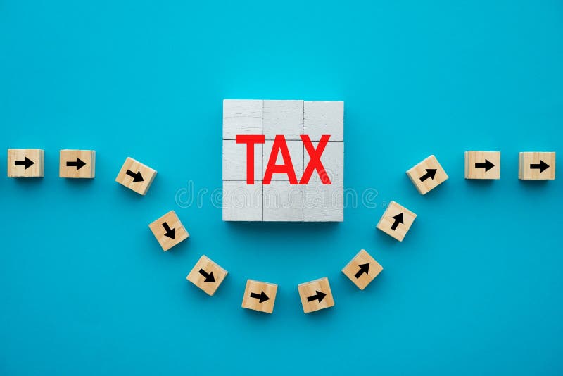 Flat Lay of Arrow Symbol Block Avoid TAX Word Block on Blue Background ...