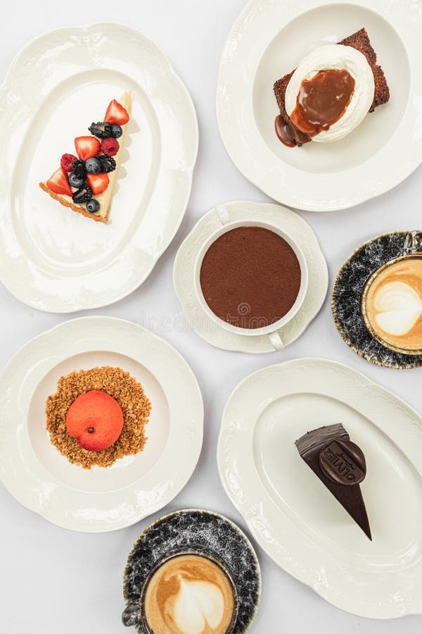 Flat Lay of Assorted Desserts on White Table Stock Image - Image of ...