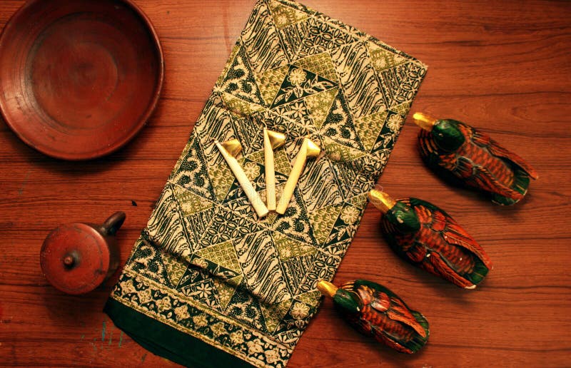 Flat Lay Batik Clotes with Canting, Small Pan and Wax Earthenware Glass ...