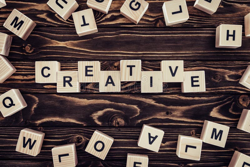 Flat Lay with Blocks Arranged in Creative Word on Brown Stock Image ...