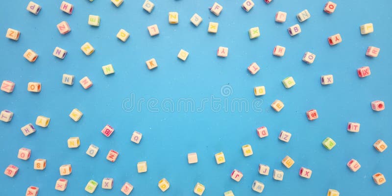 Flat Lay, Blue Background and Alphabet Plastic Cube Bead Element Design ...