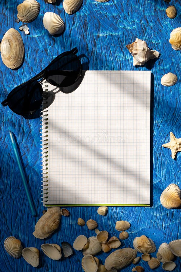 Flat Lay on Blue Background Blank Notebook Copy Space. Summer Plans ...