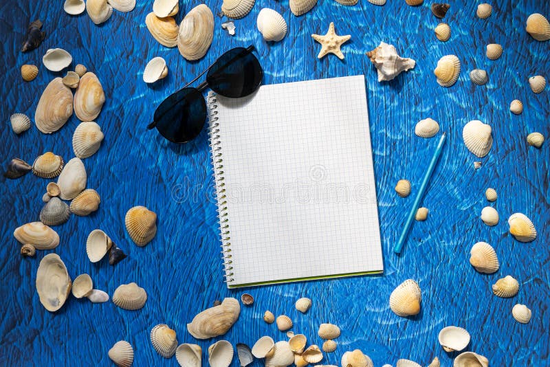 Flat Lay on Blue Background Blank Notebook Copy Space. Summer Plans ...