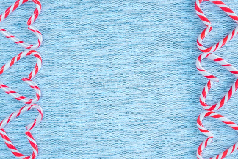 Flat Lay Border of Mini Red and White Candy Canes in Heart Shapes Stock ...