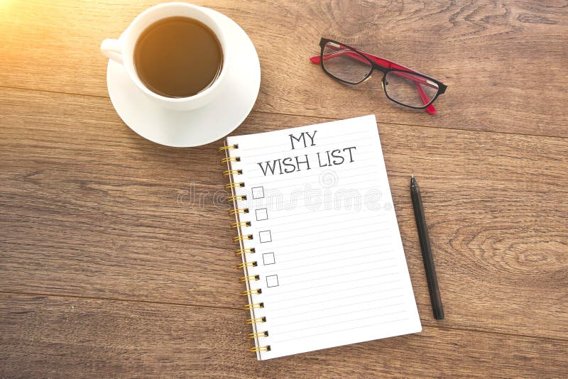 Flat Lay on a Brown Desk, a Notebook with Text My Wish List, a Cup of ...