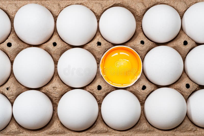 Flat Lay Close-up View of Chicken Eggs with Broken Egg in Egg Crate ...