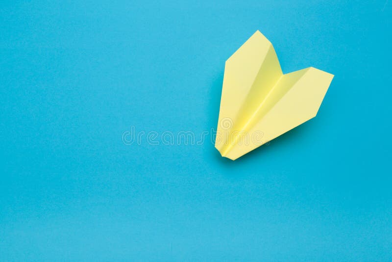 Flat Lay of Colour Paper Plane on Blue Background with Text Space Stock ...