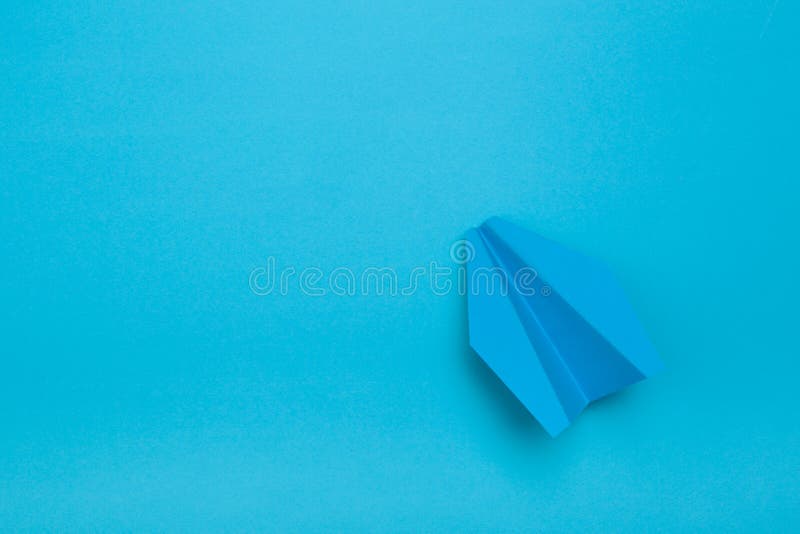 Flat Lay of Colour Paper Plane on Blue Background with Text Space Stock ...
