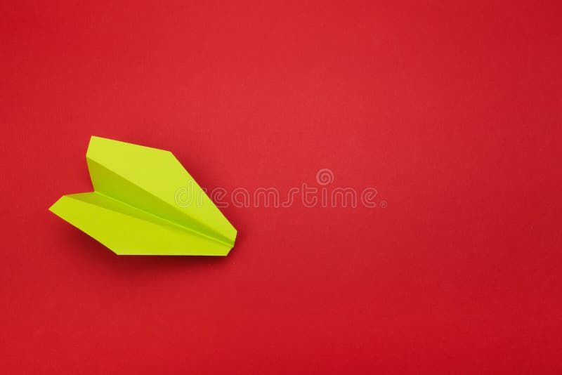 Flat Lay of Colour Paper Plane on Red Background with Text Space Stock ...