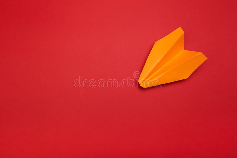 Flat Lay of Colour Paper Plane on Red Background with Text Space Stock ...