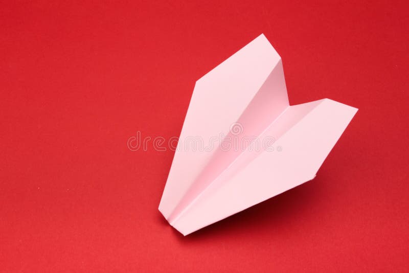 Flat Lay of Colour Paper Plane on Red Background with Text Space Stock ...