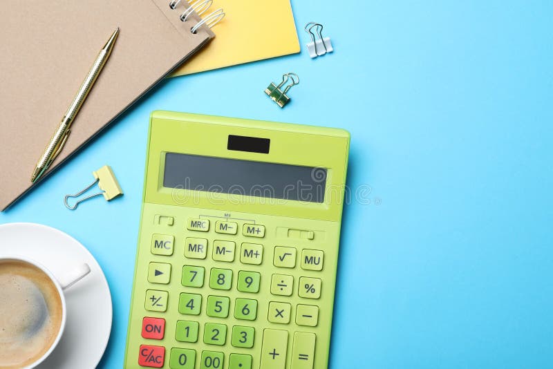 Flat Lay Composition with Calculator and Stationery on Light Blue ...