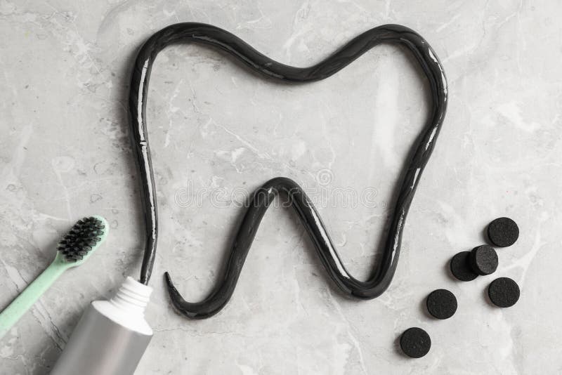 Flat Lay Composition with Charcoal Toothpaste on Light Grey Table Stock ...