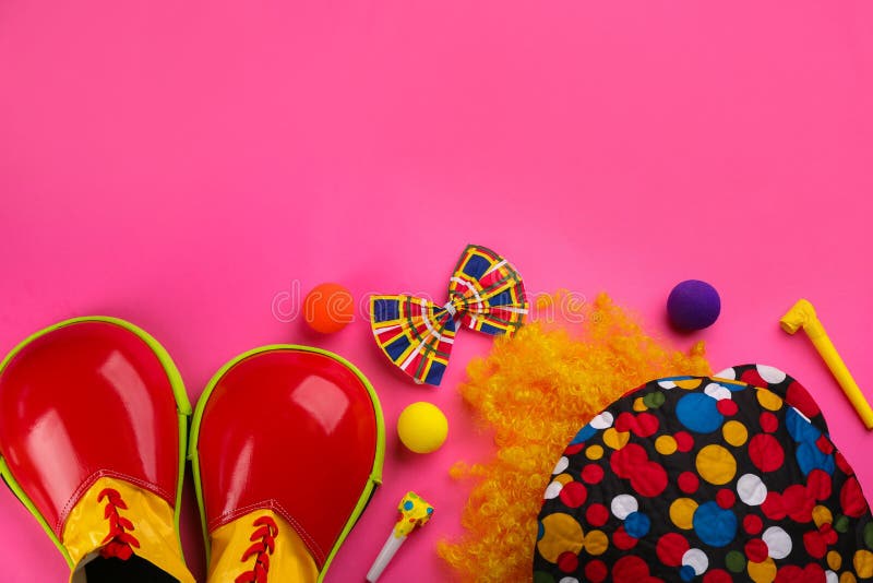 Flat Lay Composition with Clown`s Accessories on Pink Background. Space ...