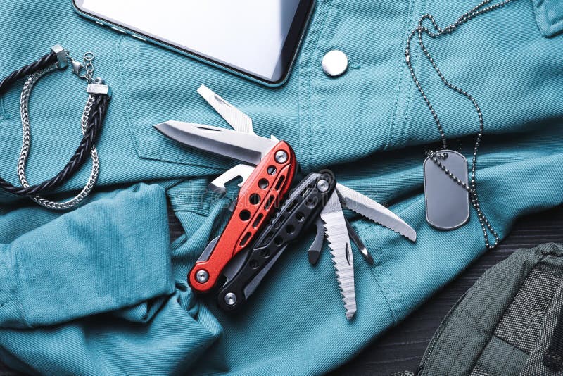 Flat Lay Composition with Compact Portable Multitool and Accessories on ...