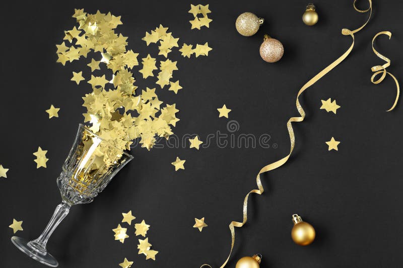 Flat Lay Composition with Confetti and Glass on Black Background ...