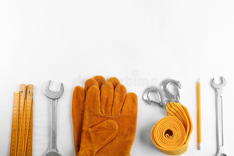 Flat Lay Composition with Construction Tools and Safety Equipment on ...