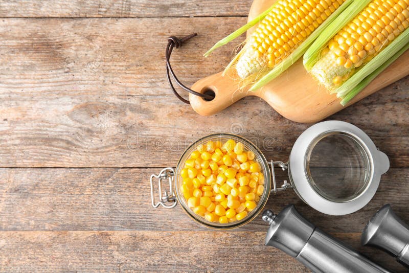 Flat Lay Composition with Corn Kernels on Wooden Background Stock Photo ...