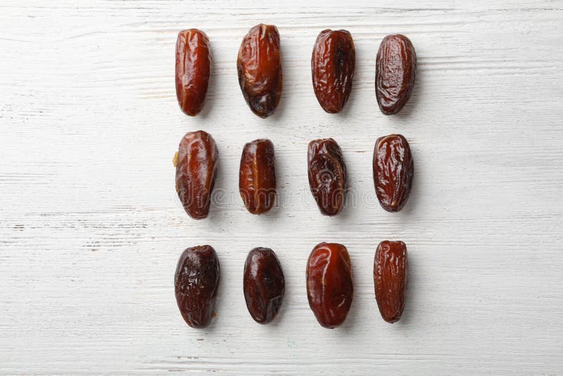 Flat Lay Composition with Dates on Wooden Background Stock Photo ...