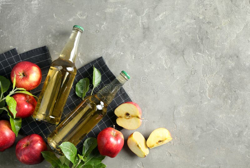 Flat Lay Composition with Delicious Apple Cider on Gray Table, Space ...