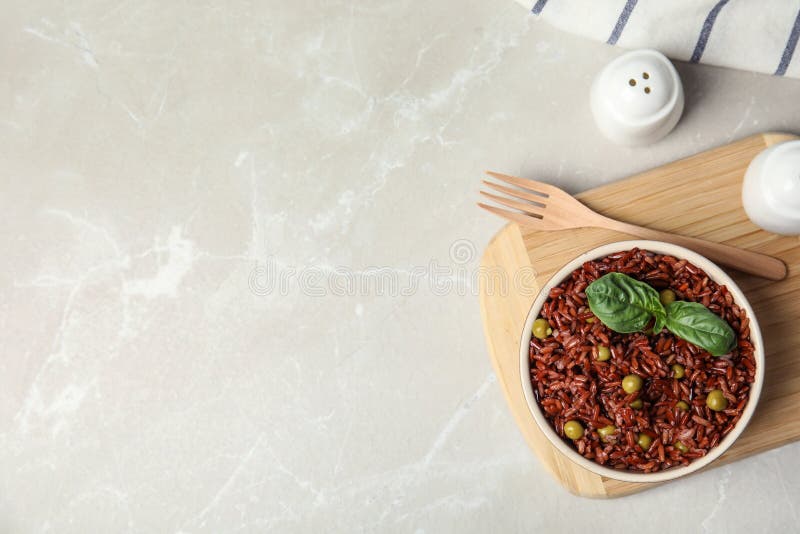 Flat Lay Composition with Delicious Cooked Brown Rice on White Marble ...