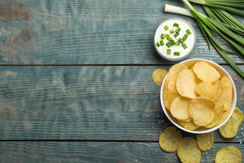 Flat Lay Composition with Delicious Crispy Potato Chips on Table Stock ...