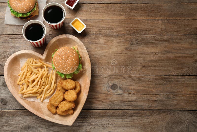 Flat Lay Composition with Delicious Fast Food Menu on Wooden Table ...