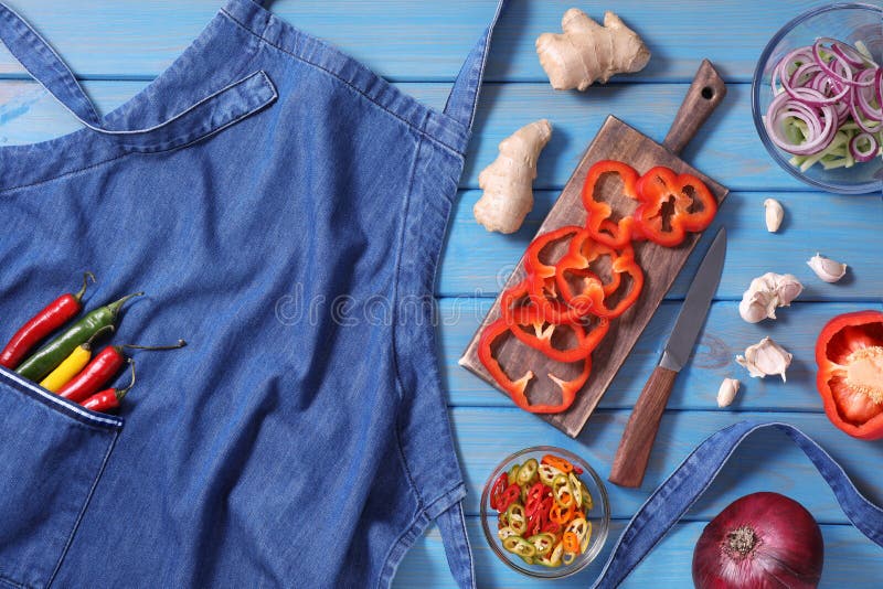 Flat Lay Composition with Denim Apron and Different Ingredients on ...