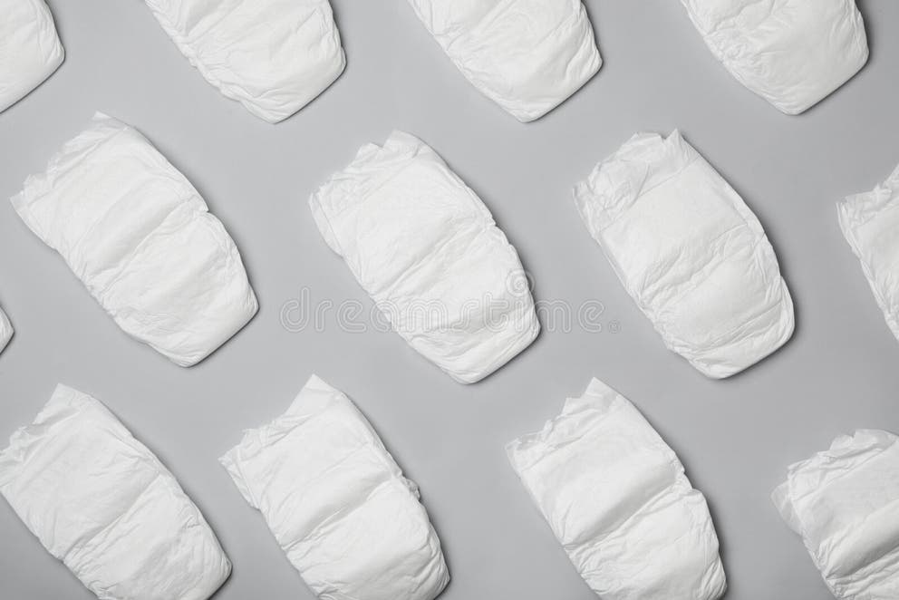 Flat Lay Composition with Diapers on Light Grey Background Stock Photo ...