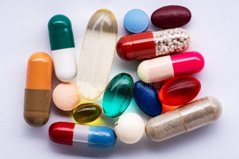 Flat Lay Composition with Different Colorful Pills. Pile of Medication ...