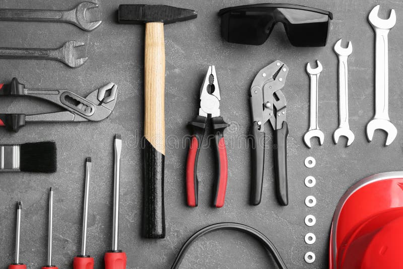 Flat Lay Composition with Construction Tools on Grey Background Stock ...