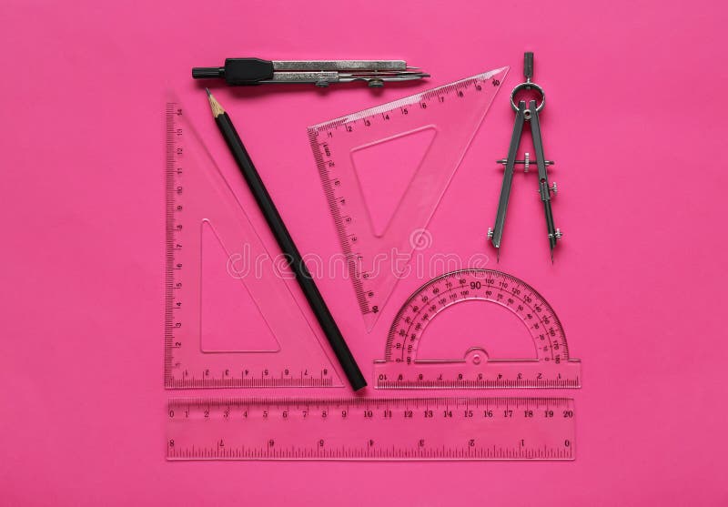 Flat Lay Composition with Different Rulers and Compass on Pink ...